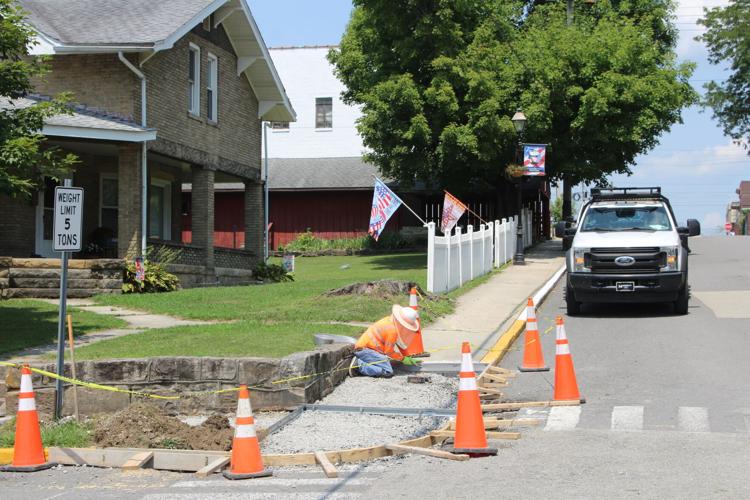 Work to install handicapped accessible sidewalks begins in Kingwood ...
