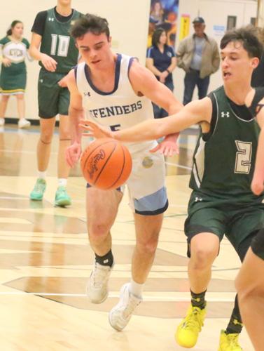 Three's galore as Defenders down Elk Valley Christian, 66-46 ...