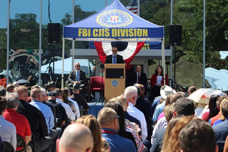 FBI unveils 9/11 memorial featuring Ground Zero artifact at CJIS campus ...