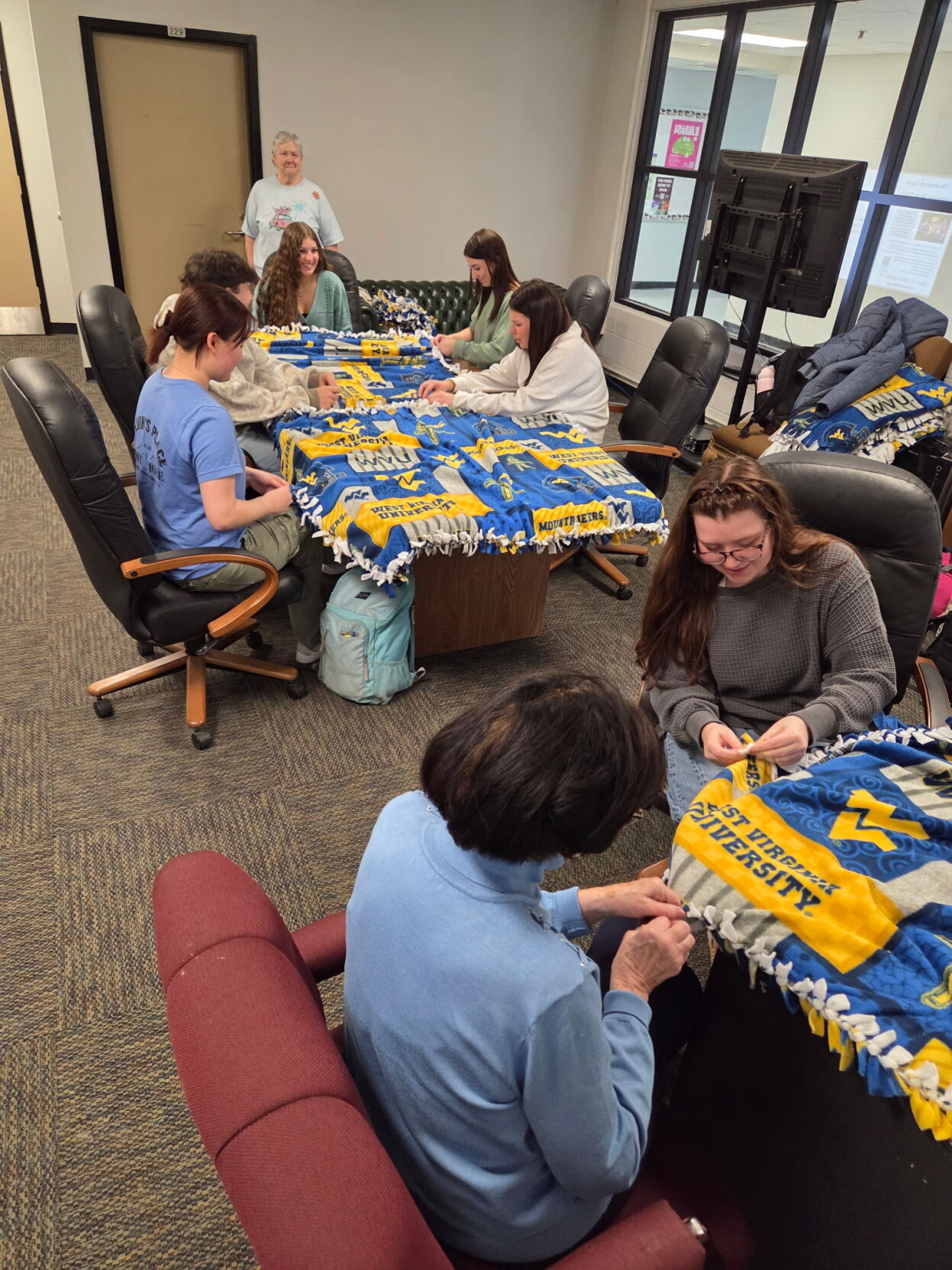 Preston High Interact Club creates WVU-themed blankets for WVU Medicine ...