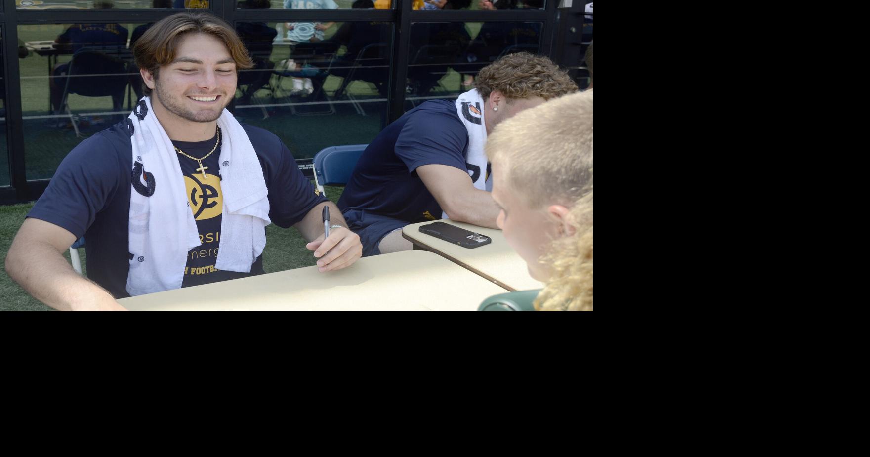 WVU football 0618 Nicco Marchiol signs at camp front | West Virginia ...