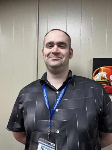 Officials celebrate new stairlift at Clarksburg Mission with ribbon ...