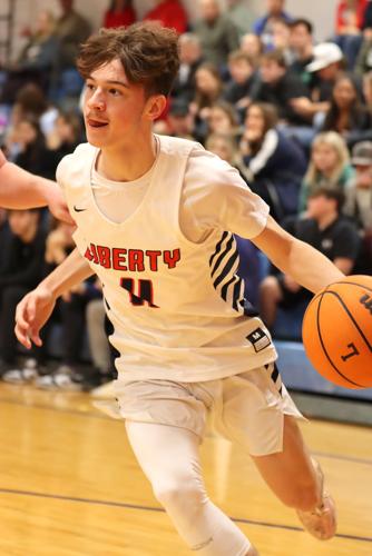 LIB #11 drives the baseline.JPG | | wvnews.com