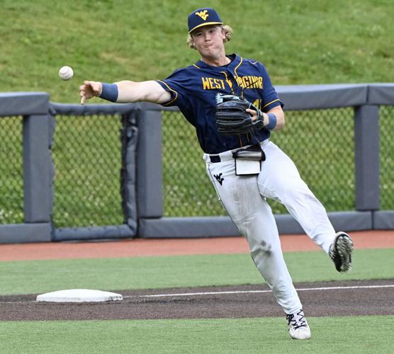 Texas smacks WVU again, sets up final game showdown with title and ...