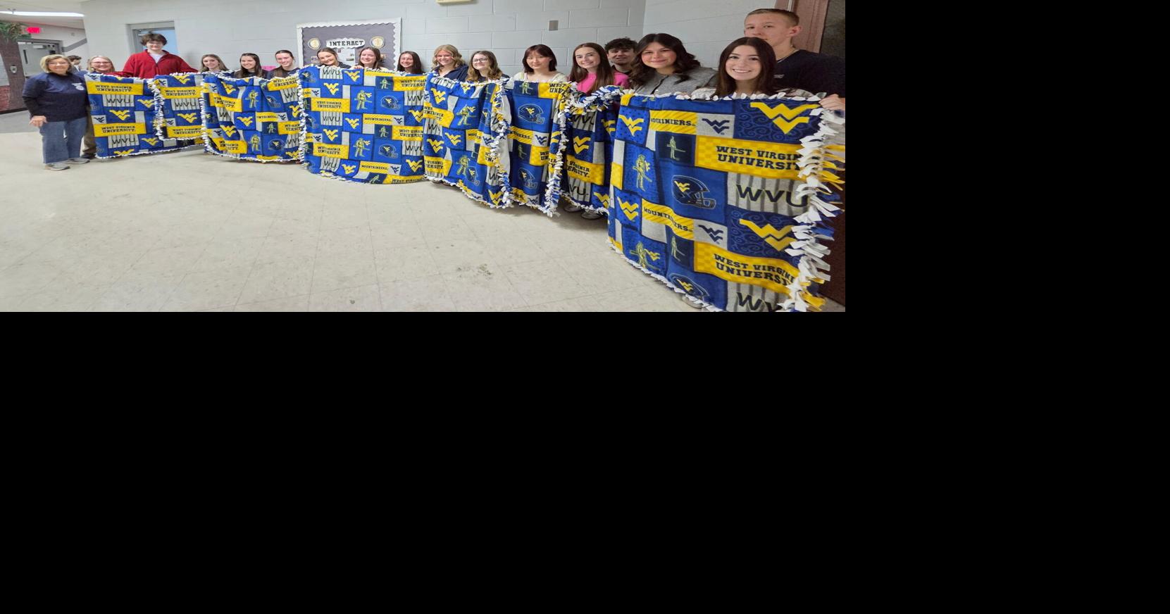 Preston High Interact Club creates WVU-themed blankets for WVU Medicine ...