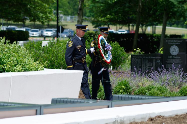 FBI CJIS Division in Clarksburg, West Virginia holds memorial ceremony ...