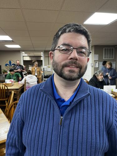 Officials celebrate new stairlift at Clarksburg Mission with ribbon ...