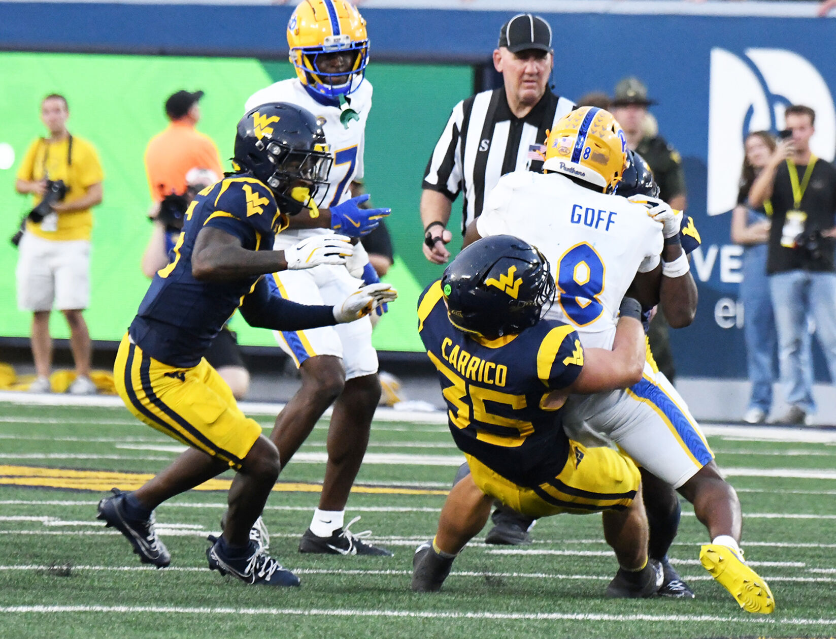 WVU football 0913 Reid Carrico wrestles down front | West Virginia ...