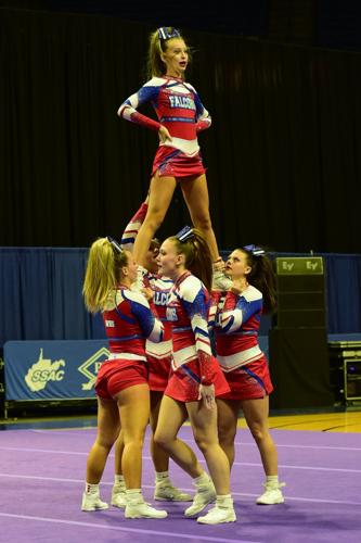 Logan captures Class AA cheer titles while Man wins Class A competition ...