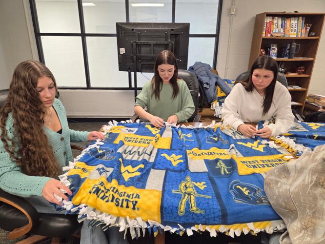 Preston High Interact Club creates WVU-themed blankets for WVU Medicine ...