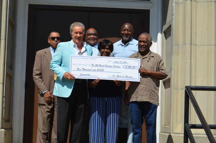 Glenville State University president presents check to West Virginia ...