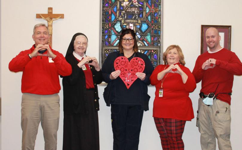 St. Joseph's Hospital employees participate in Wear Red Day | | wvnews.com