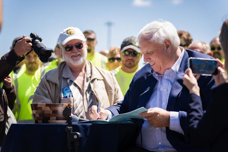 West Virginia Gov. Justice signs $150 million secondary roads paving ...