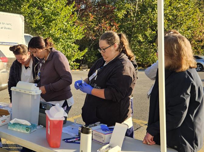 Drive-through flu shot clinic held at St. Joseph's Hospital in ...