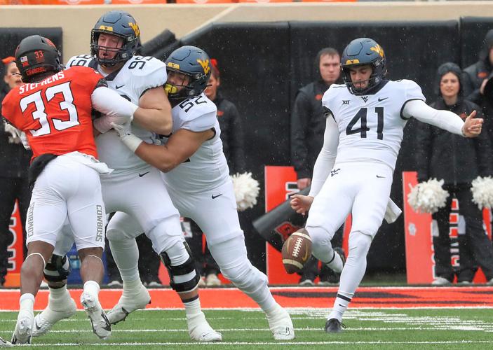 Dancing through raindrops for a win at Oklahoma State | West Virginia ...