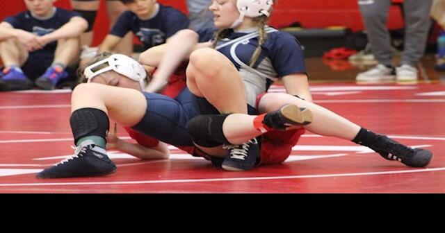 Frankfort's Madison Sponaugle wrestling her Fort Hill opponent ...