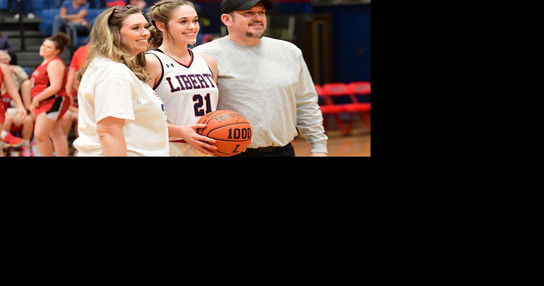 Emma Elliot poses with family with her 1000 ball.JPG | | wvnews.com