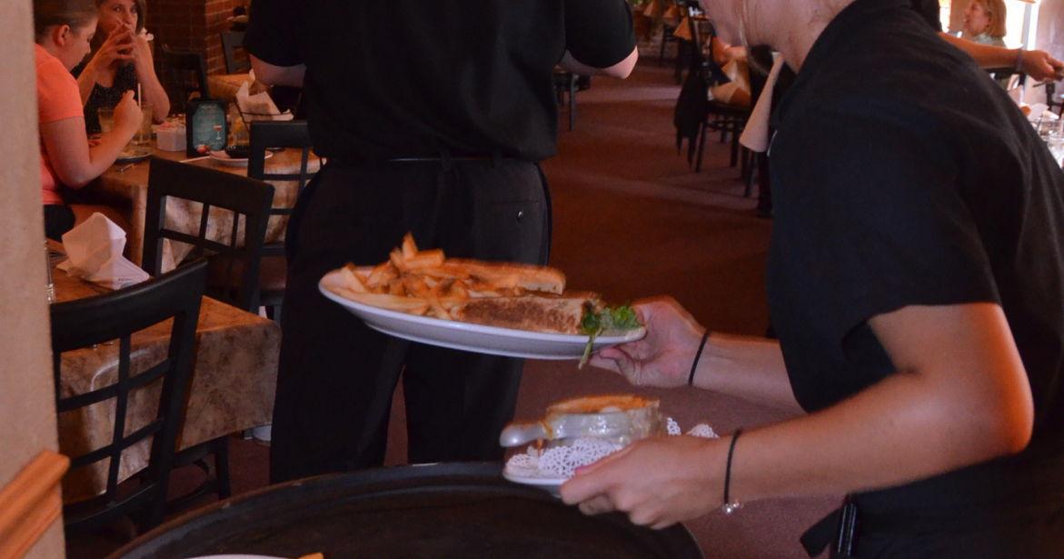 Ashley Bright gets into the groove of serving at her first job ...