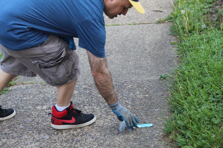North View Pride members work to clean up their neighborhood | Harrison ...