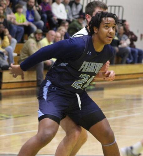 Frankfort's Jeremiah Babo boxes out his Keyser opponent Drew Matlick ...