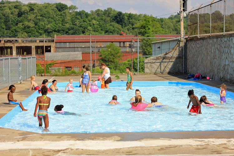 Kids of all ages enjoying Fairmont area public pools, Splash Park ...