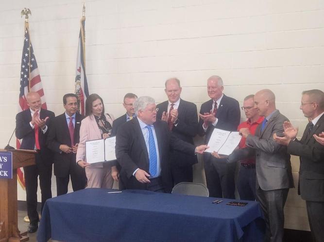Gov. Patrick Morrisey signs microgrid, permitting bills to boost West ...