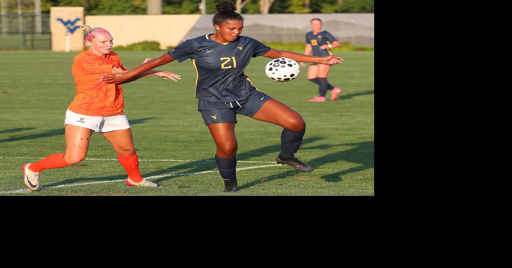 WVU downs Cincinnati on rainy Morgantown evening | West Virginia ...