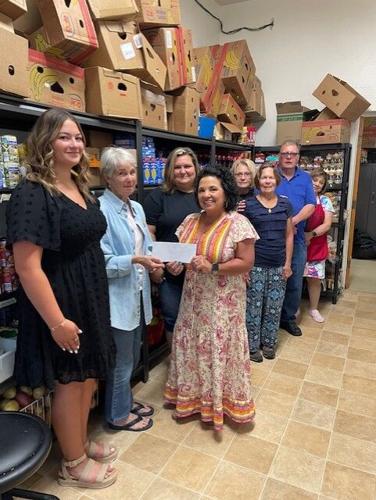 Expressions of Love Charity donates to the Mustard Seed | Harrison News ...