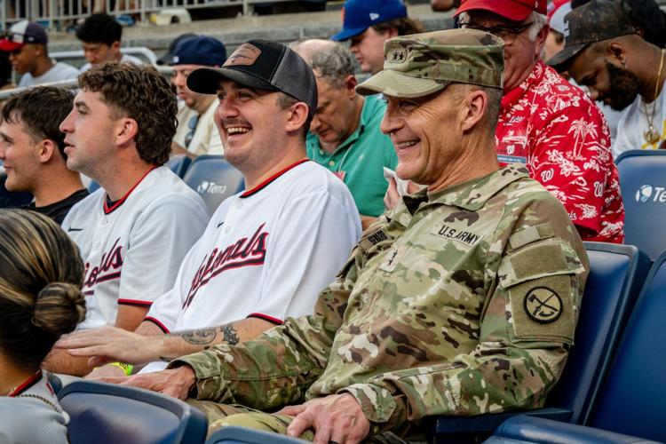 Andrew Wolfe throws first pitch at Washington Nationals game after ...