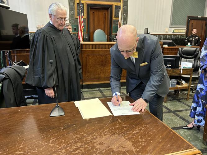 McMunn takes oath to become newest Harrison Circuit judge | WV News ...