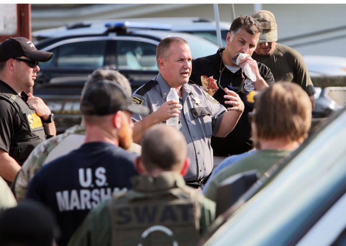 Suspect shot after firing at police dies; 3 other suspects in custody ...