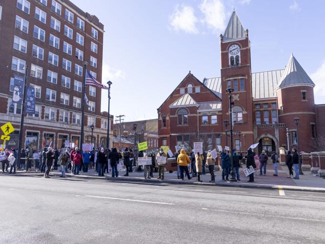 Morgantown (West Virginia) protesters target President Trump, Elon Musk ...