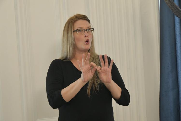 Sign language interpreters play important role during pandemic | WV ...