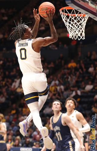 Tre Mitchell helps lead West Virginia to season-opening victory | West ...