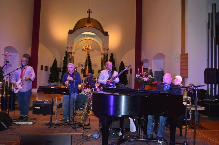 John Angotti Christmas concert draws overflow crowd; features holiday ...