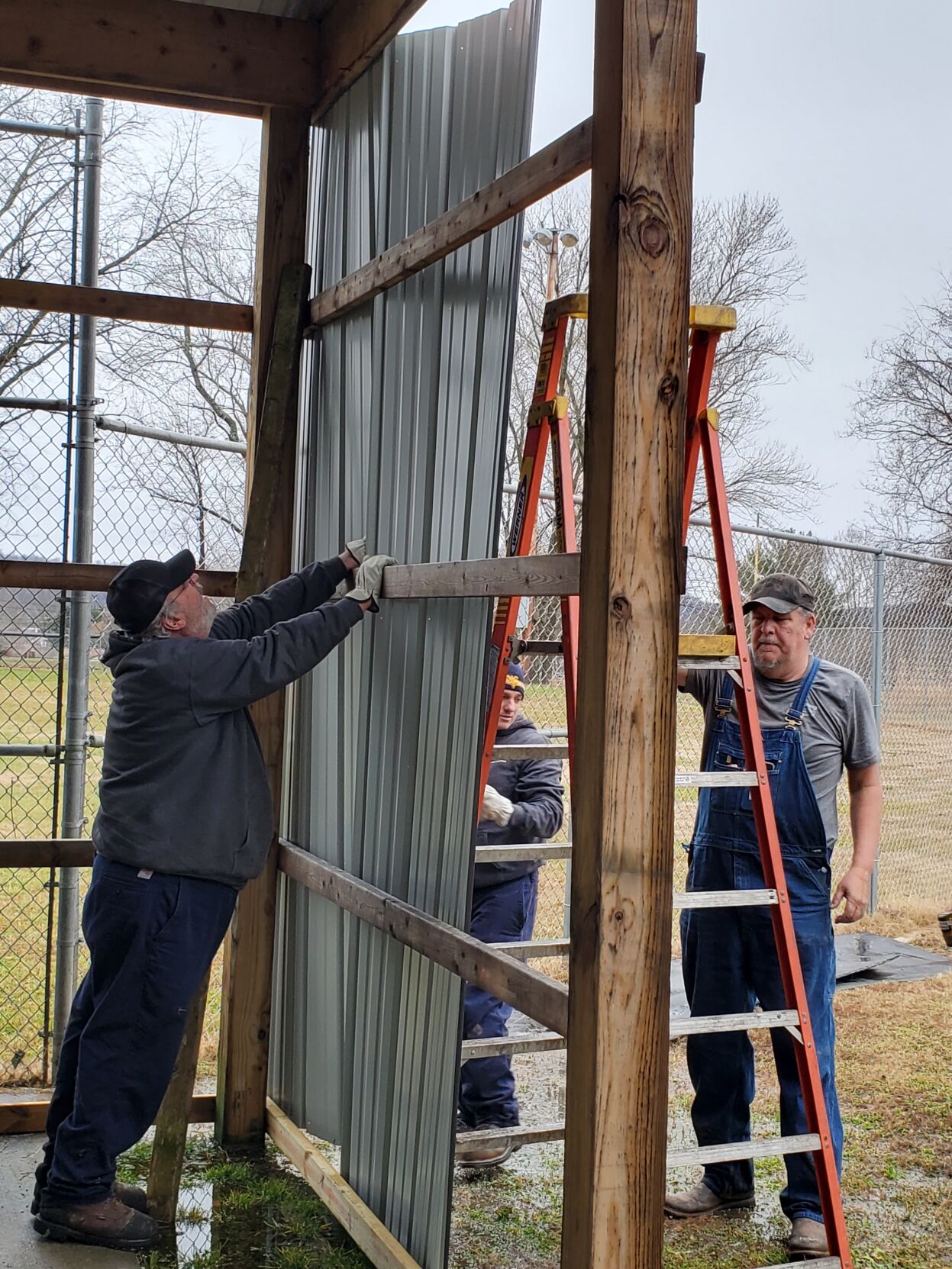 Volunteers enclose batting cages at Jack Hesson Field | Jackson Star ...