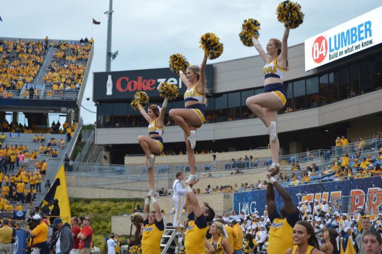 WVU cheerleaders bring pep, spirit to Mountaineer Field | NCWV Life ...