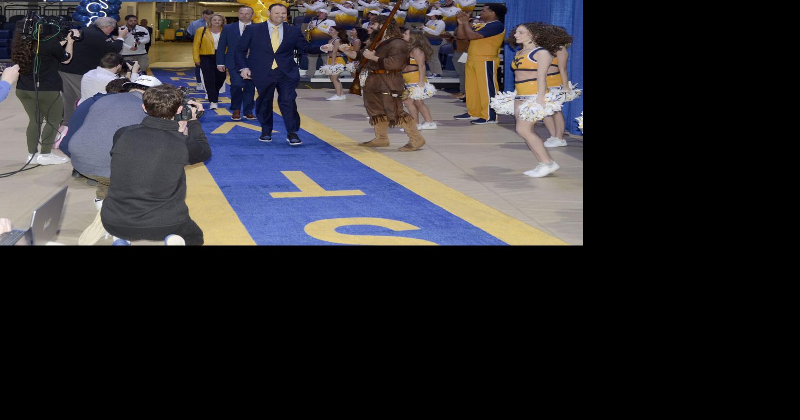 WVU basketball 0328 Darian DeVries presser Wren Baker walks carpet ...
