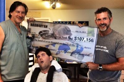 Fumich presents $107,156 check to family of Ryan Diviney | Local News ...