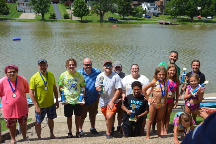 Individuals kayak, paddleboard in Bridgeport's (West Virginia) Maple ...