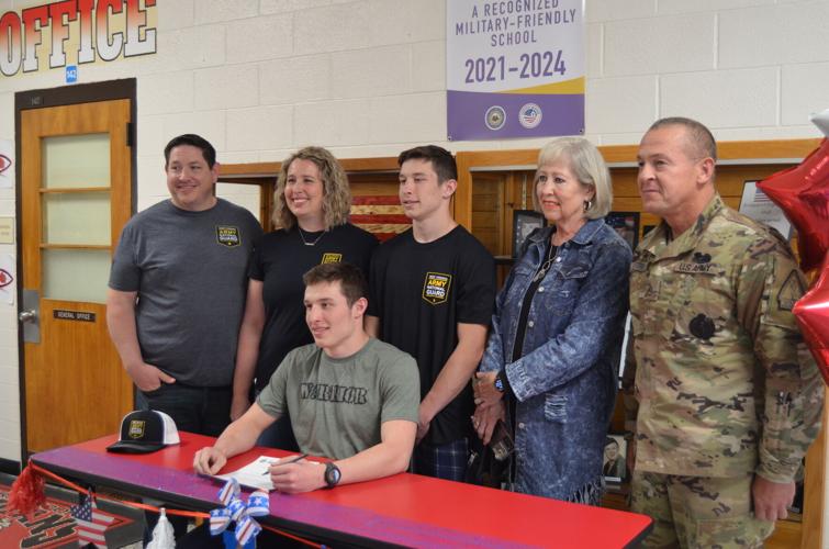 Students sign the dotted line on military signing day at Bridgeport ...