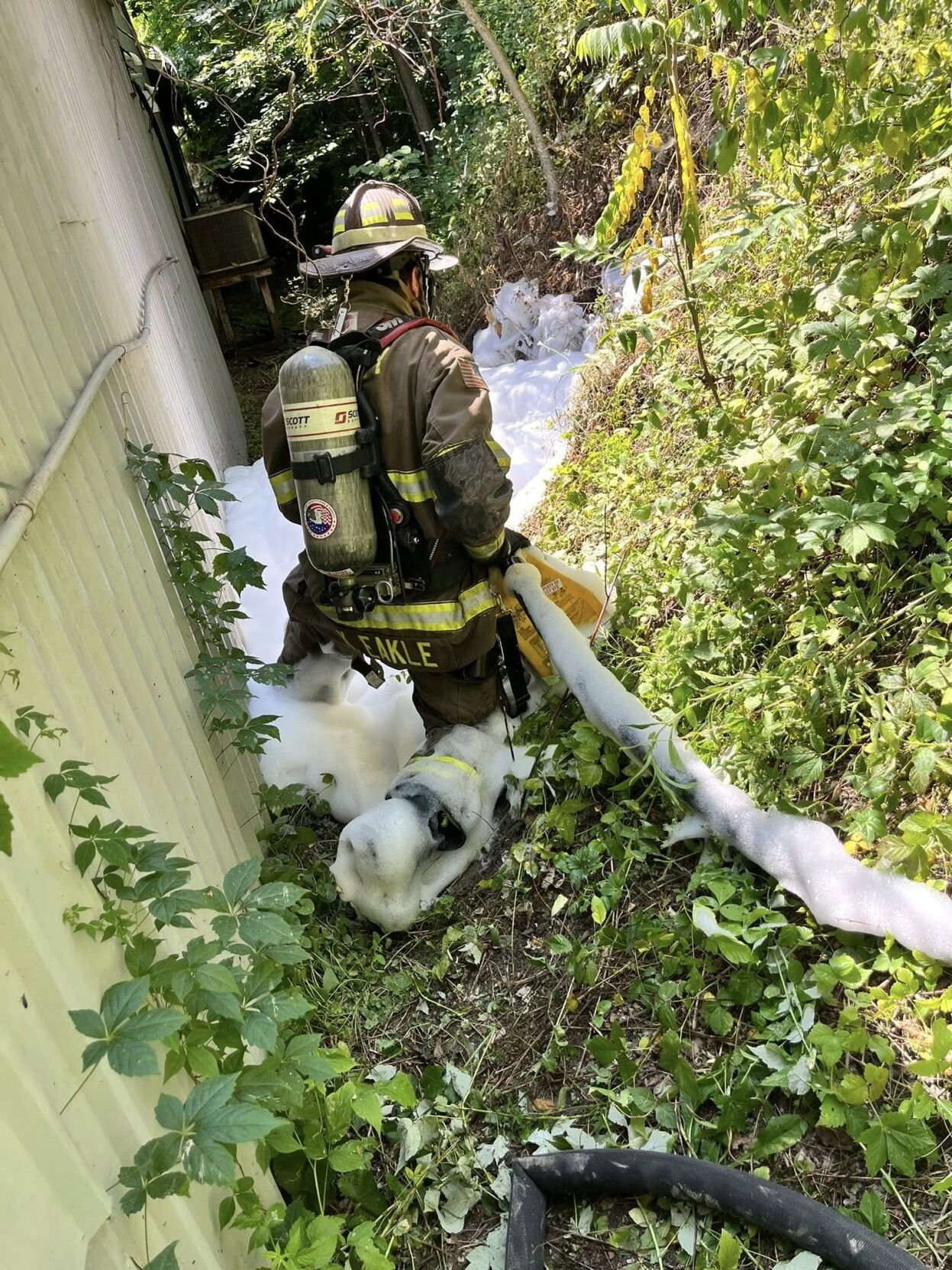 Years-old coal seam fire breaches ground behind White Hall, West ...