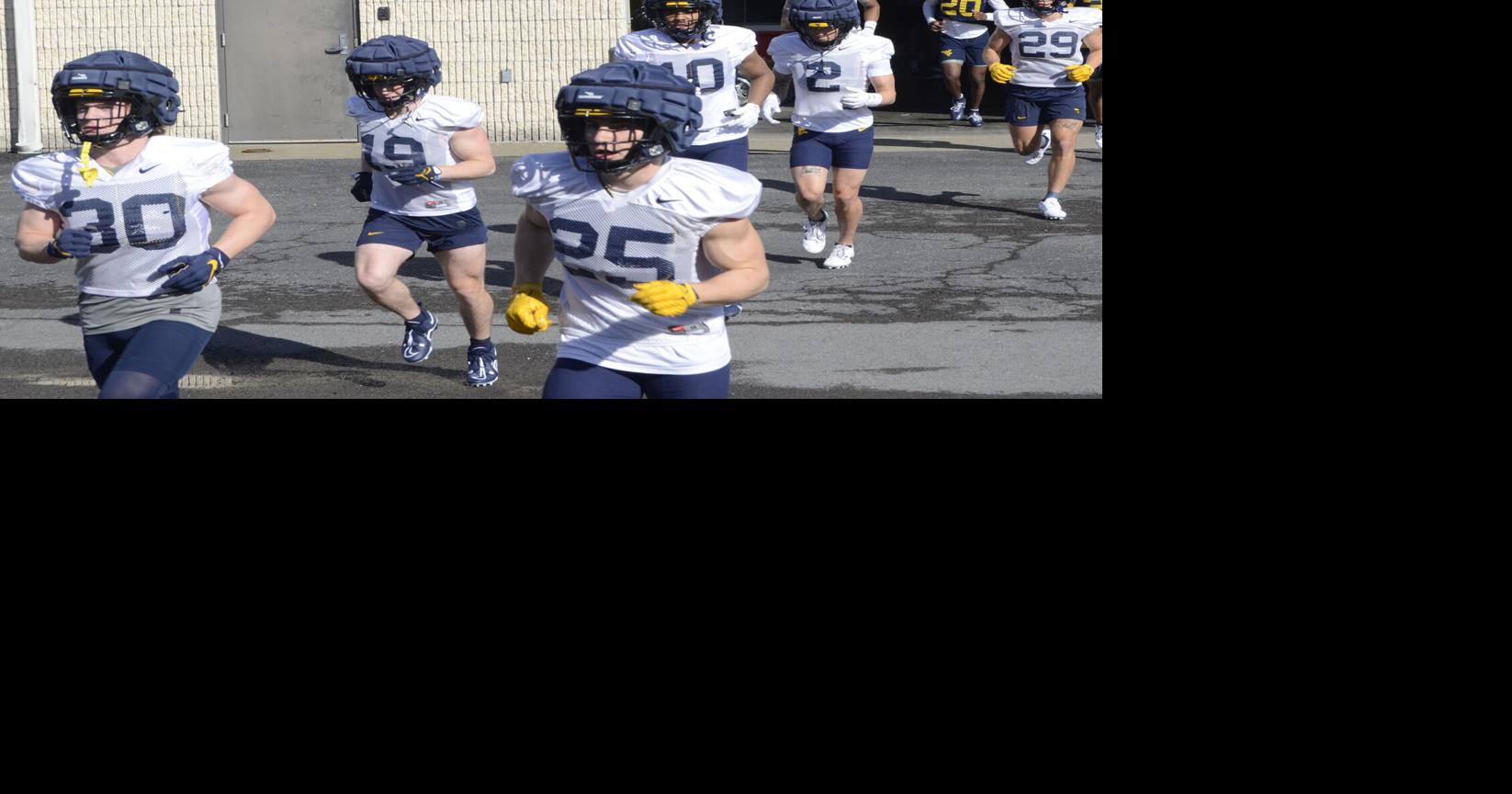 WVU football 0327 Mountaineers enter front | | wvnews.com
