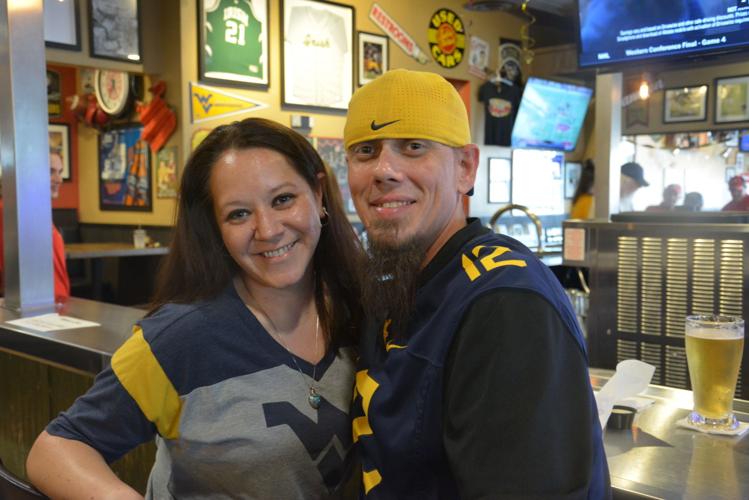 West Virginia University football fans maintain loyalty to home team ...