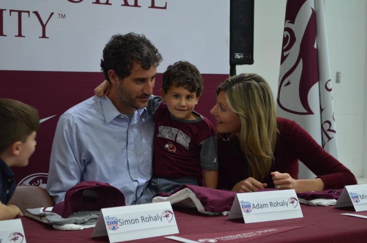 Fairmont, WV, State University signs 5-year-old cancer survivor ...