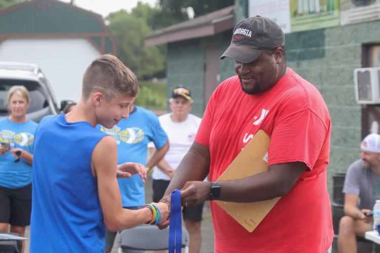 Harrison County YMCA 5K raises money for youth programs with dozens of ...