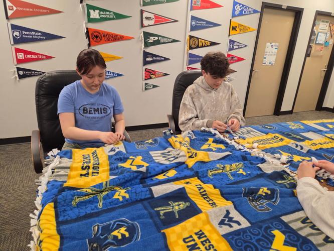 Preston High Interact Club creates WVU-themed blankets for WVU Medicine ...