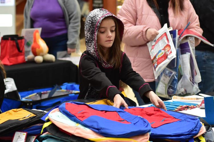 Repack the Backpacks provides families with supplies, books for ...