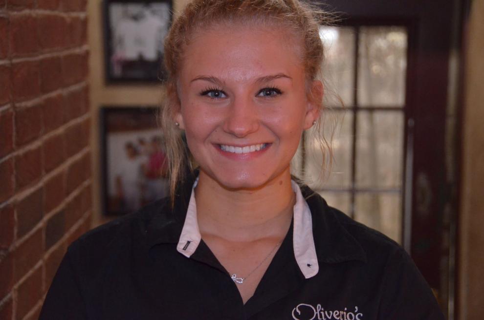 Ashley Bright gets into the groove of serving at her first job ...