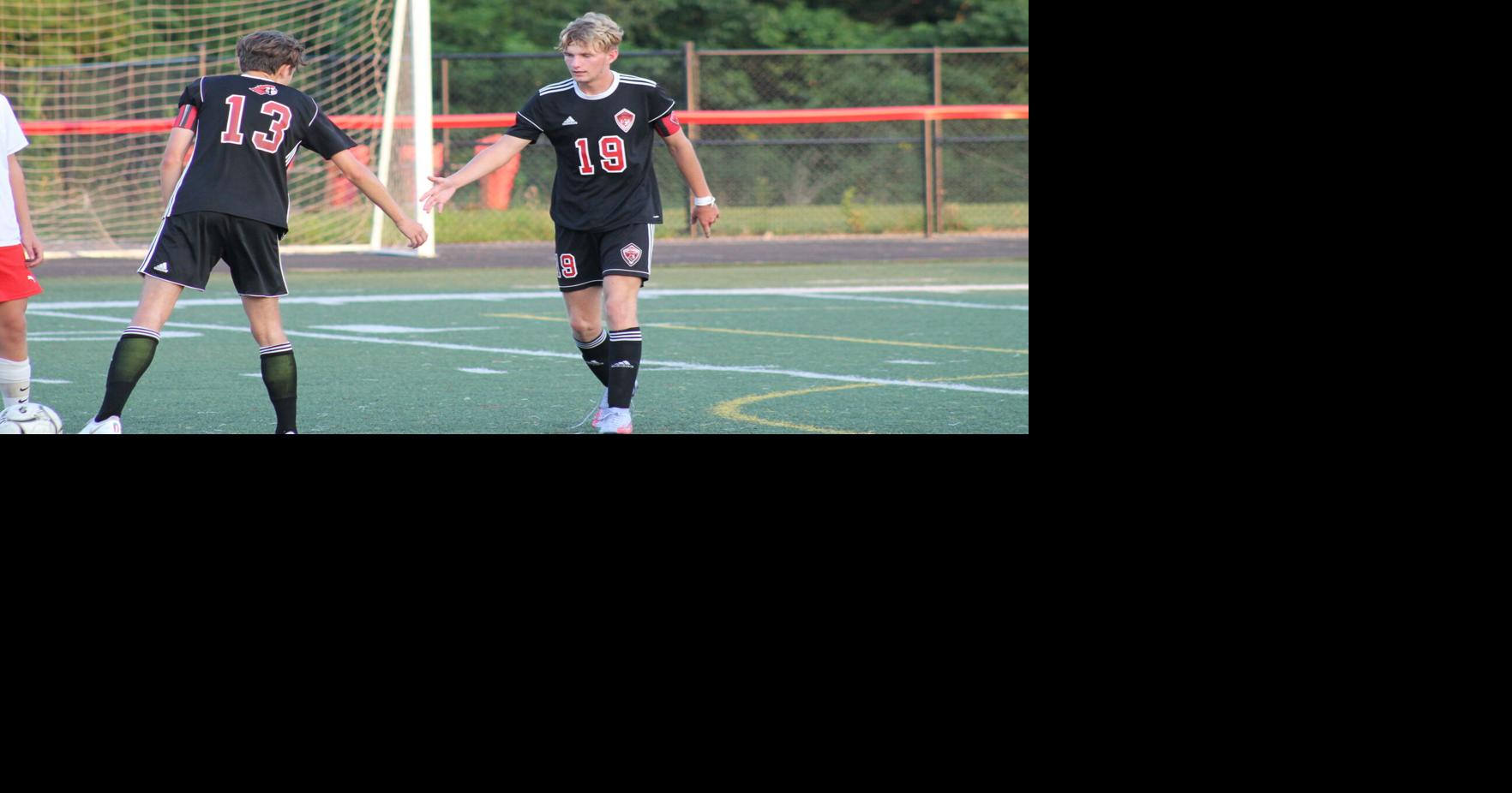 Point Pleasant's Colton Young celebrating his goal with Ian Wood ...
